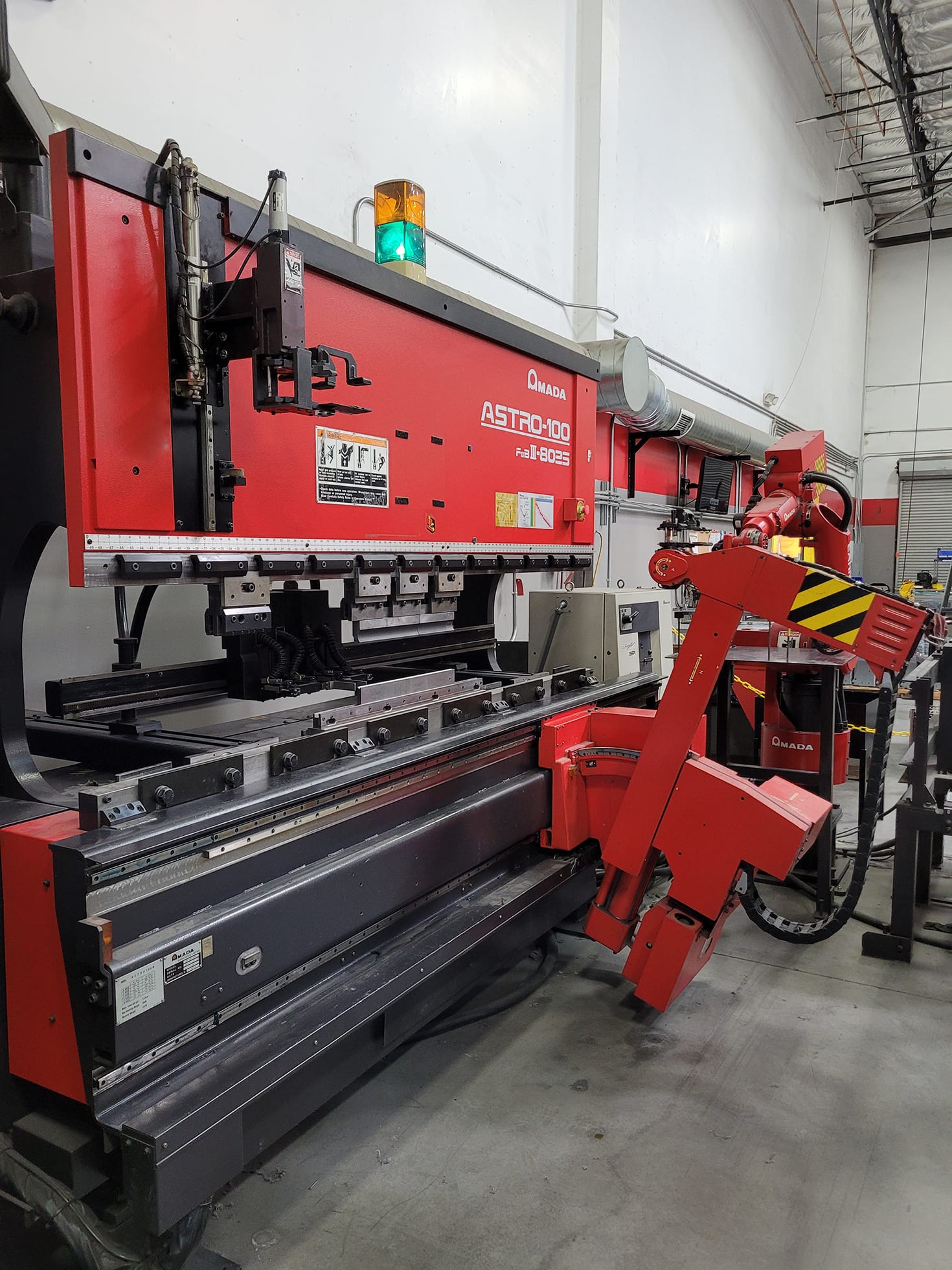 Amada Astro 100 Robotic Press – Bridge Tronic Global