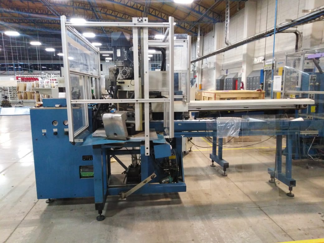 Komax Alpha 411 Cutting Machine – Bridge Tronic Global